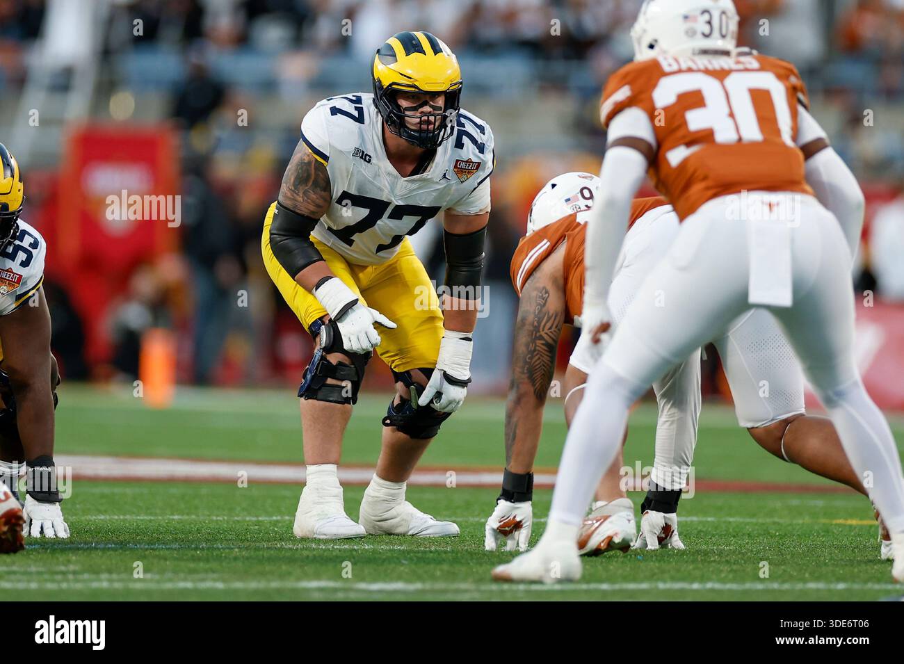 ORLANDO, FL - DECEMBER 31: Blake Frazier #77 of the Michigan Wolverines ...