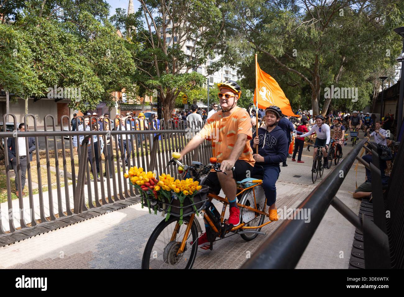 Cyclists use the new Sydney Harbour Bridge Cycleway Ramp, just after it ...