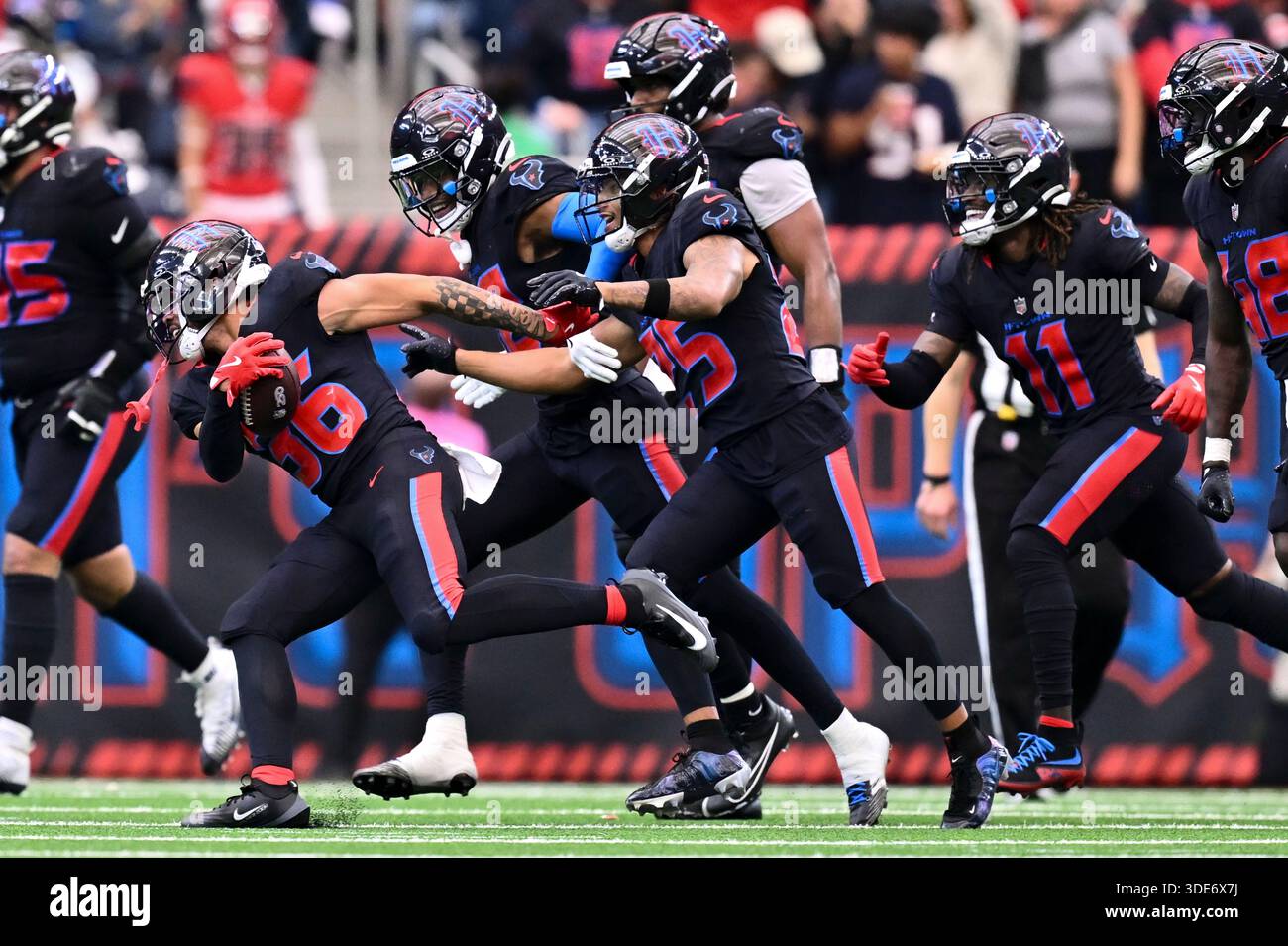 Houston Texans cornerback Alijah Huzzie (36) celebrates after his first ...