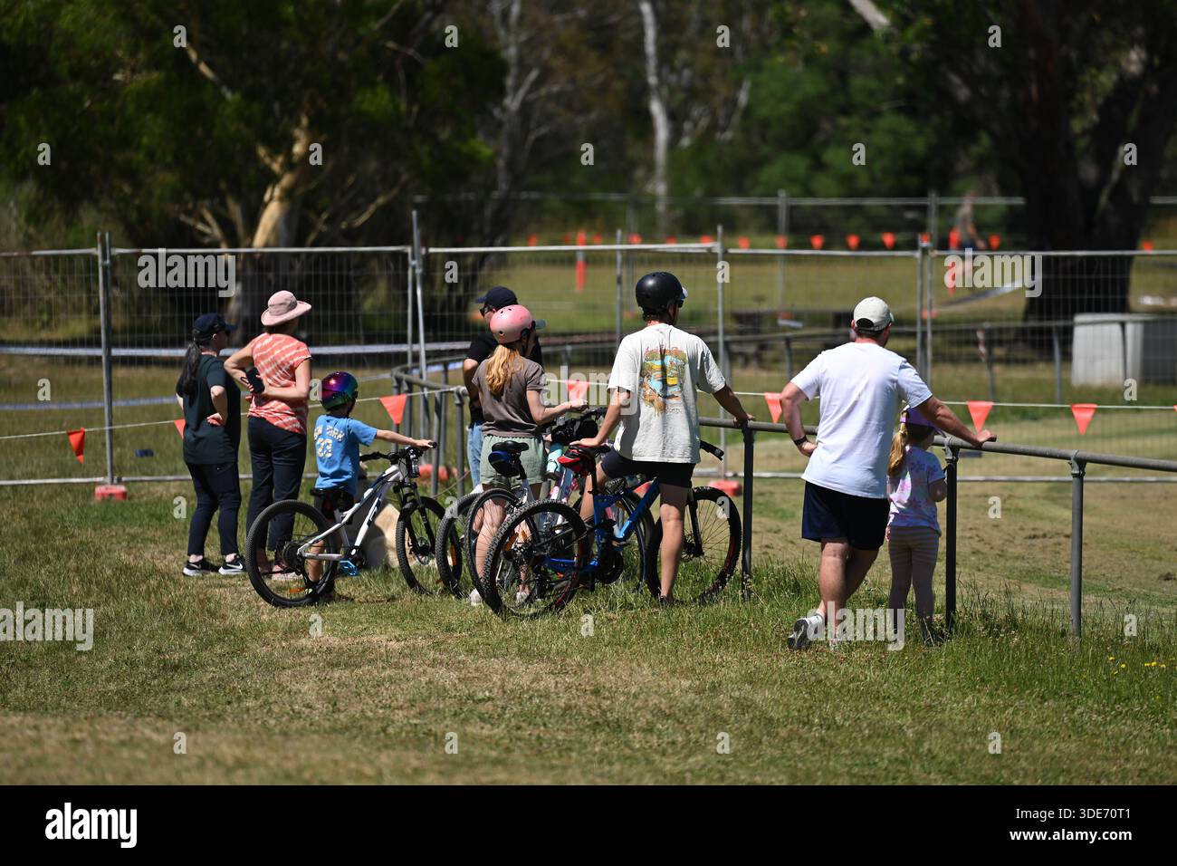 People are seen observing the sinkhole at A J Burkitt Oval in ...