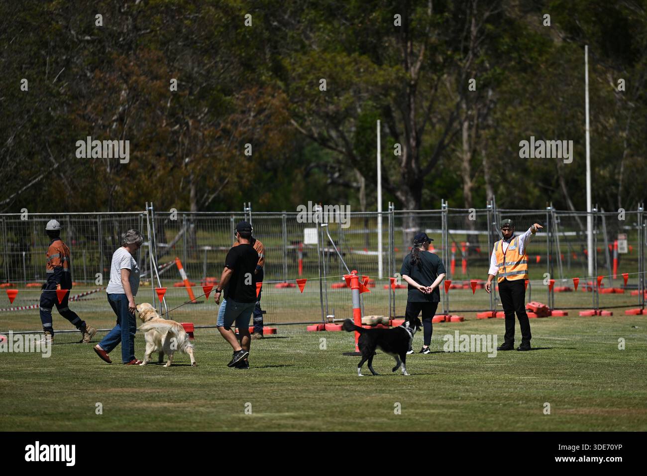 Security guards turn away on lookers at the site where a sinkhole has ...