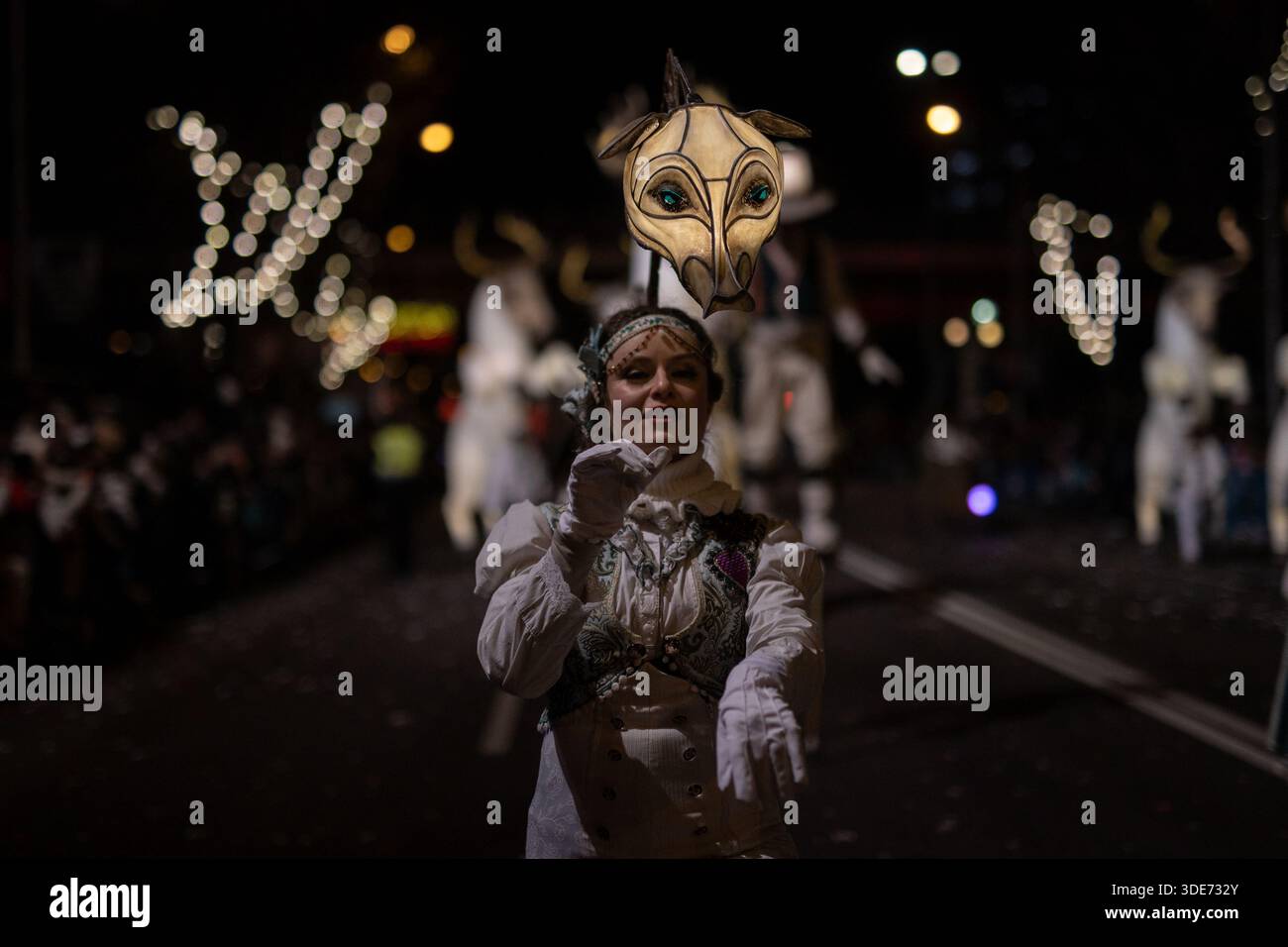 A performer carries out a skit. during the traditional Three Kings ...