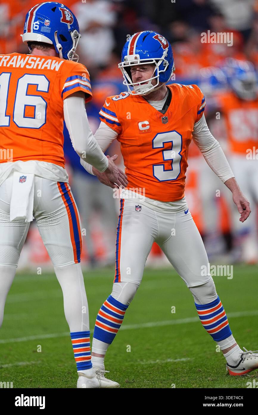 Denver Broncos holder Jeremy Crawshaw (16) congratulates kicker Wil ...