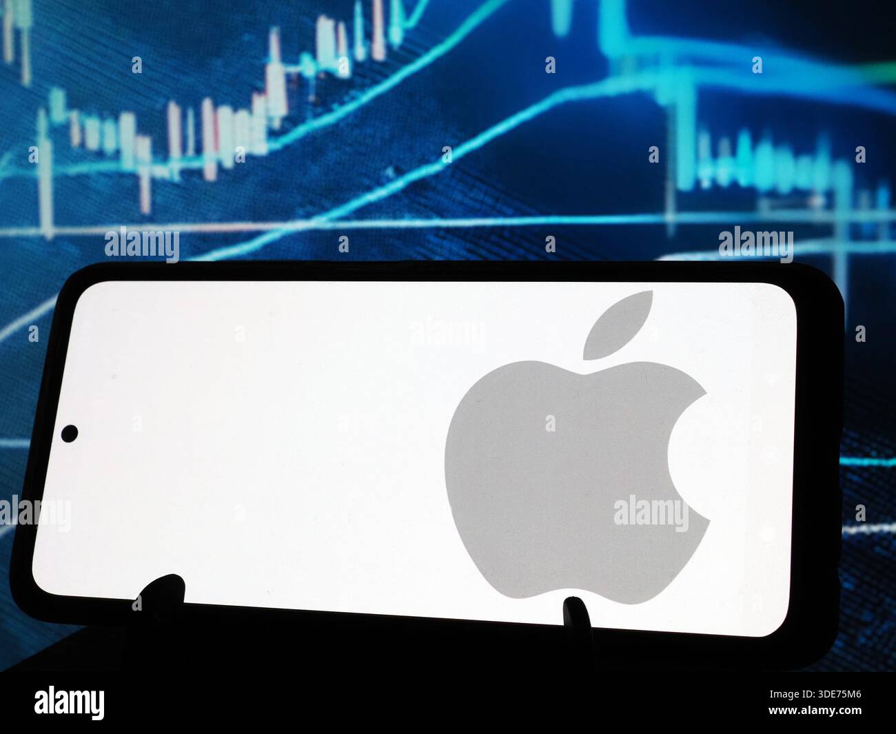 In this photo illustration, the Apple Inc. logo seen displayed on a ...