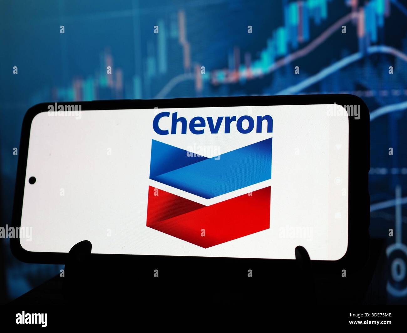 In this photo illustration, the Chevron Corporation logo seen displayed ...