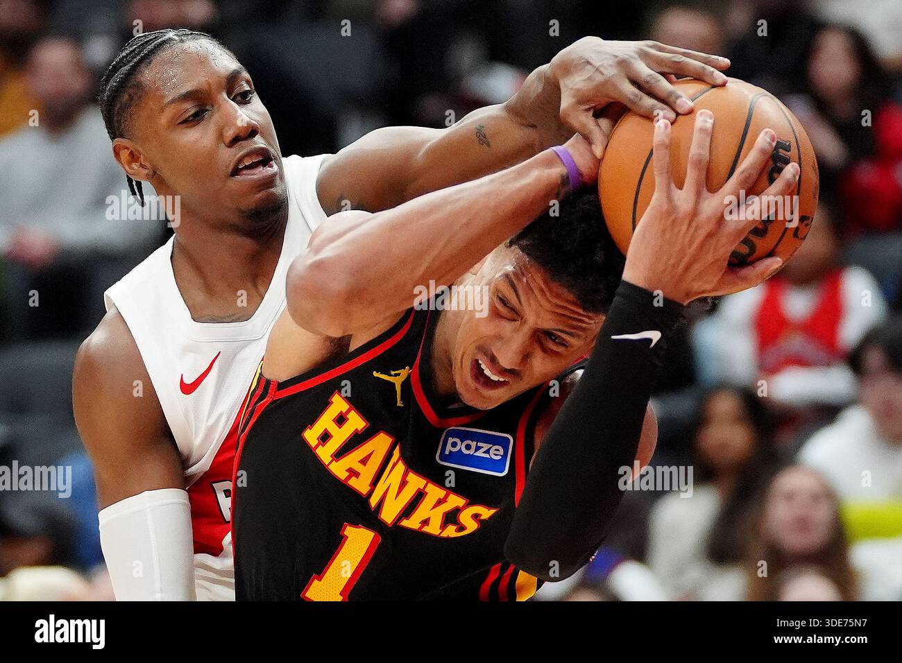 Toronto Raptors forward RJ Barrett (9) tries to strip the ball from ...