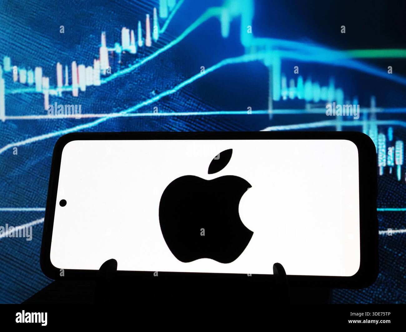 In this photo illustration, the Apple Inc. logo seen displayed on a ...