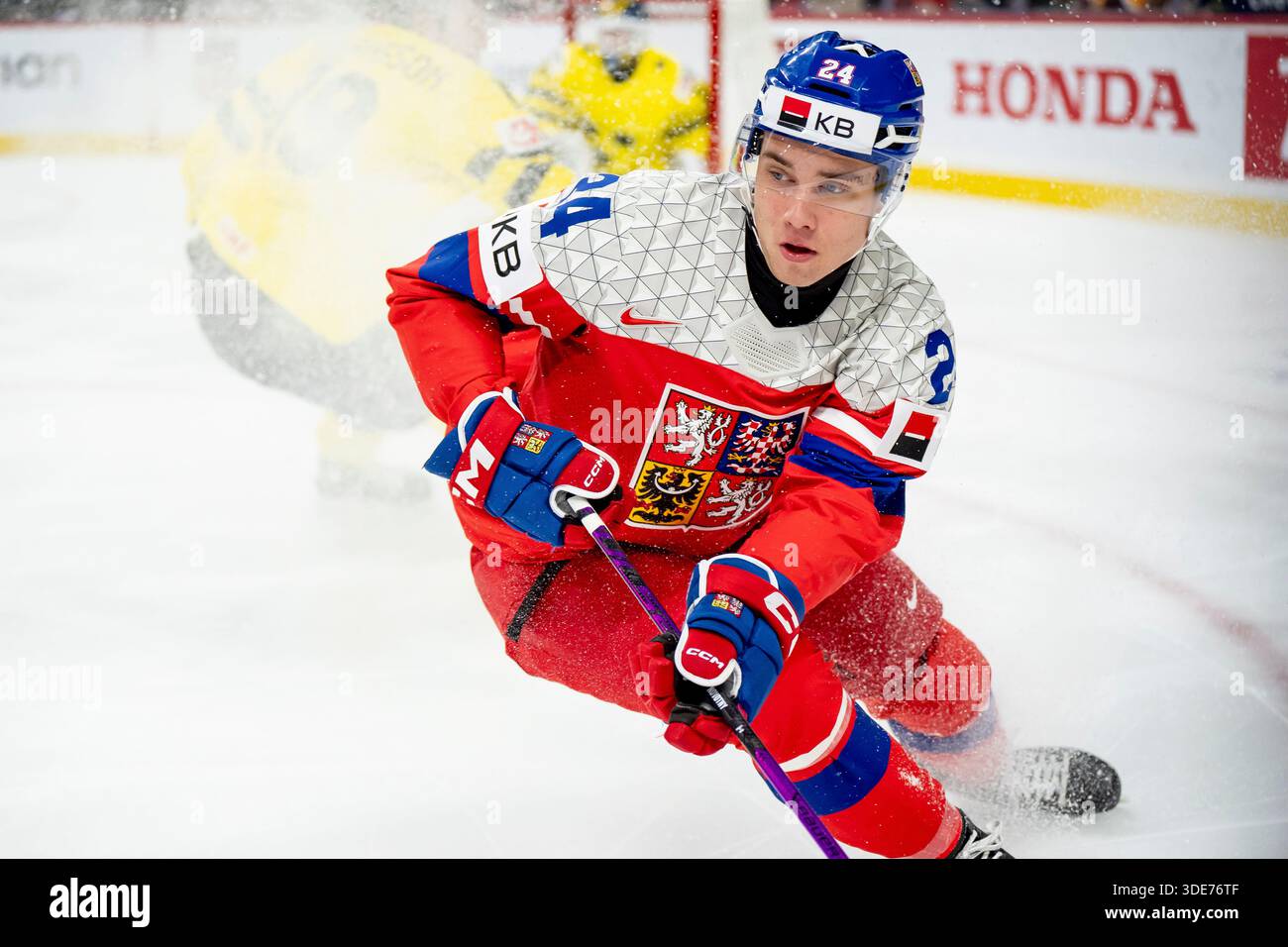 Czechia's Adam Novotny (24) skates with the puck during first period ...