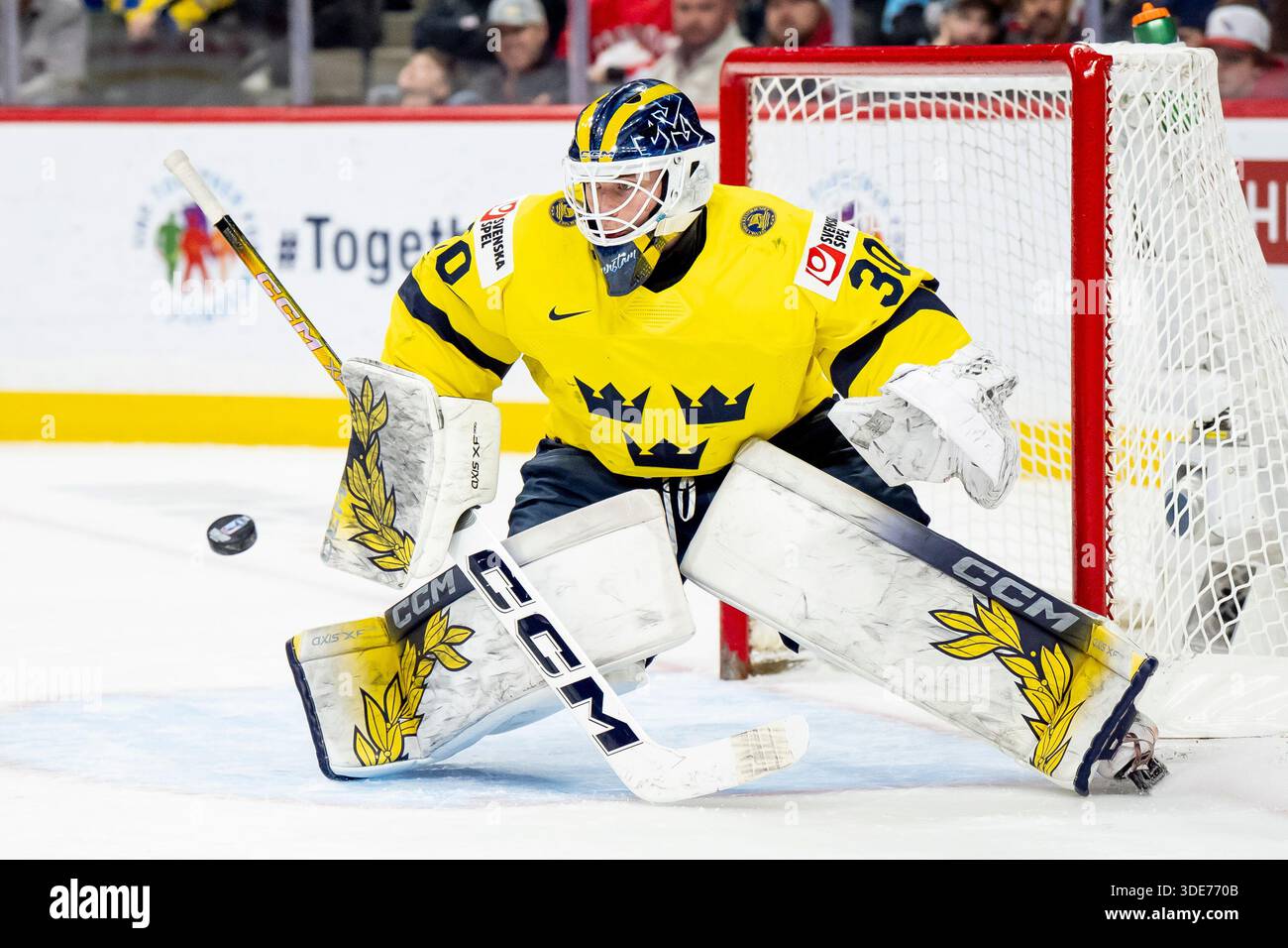 Sweden goaltender Love Harenstam (30) makes a save during first period ...