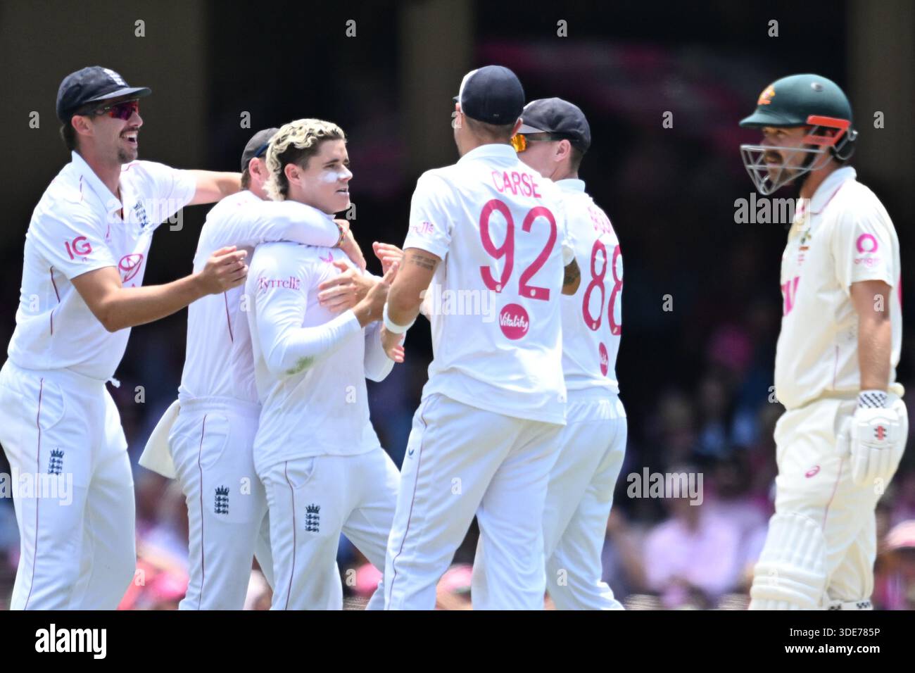 Jacob Bethell of England celebrates taking the wicket of Travis Head of ...