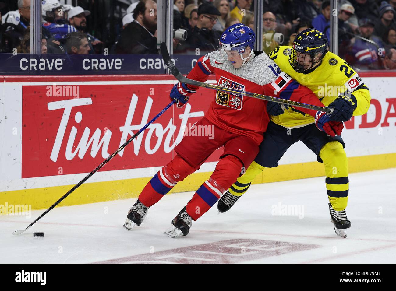 Czechia forward Maxmilian Curran (12) and Sweden Viggo Bjorck (21 ...
