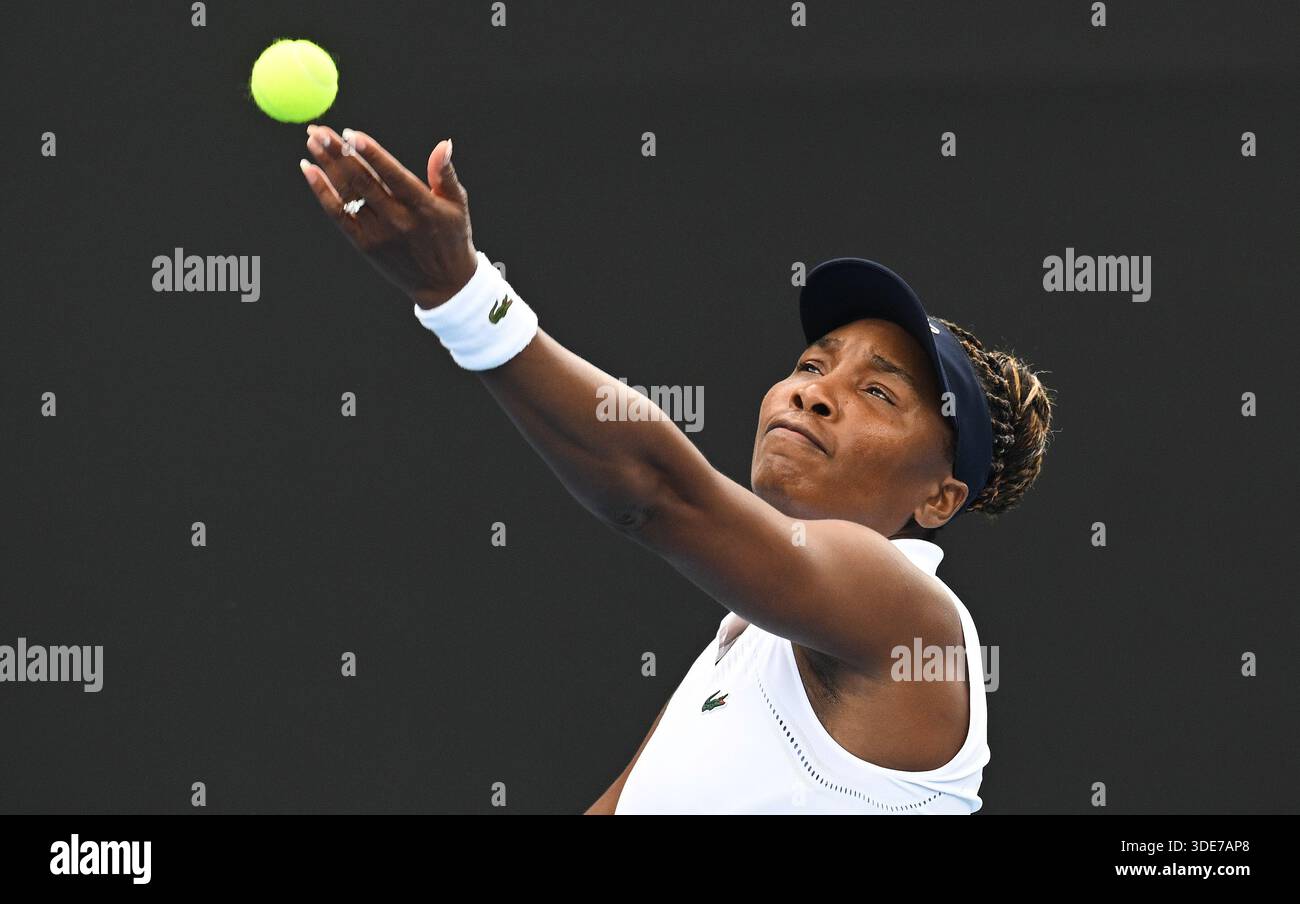 Venus Williams of the U.S. prepares to serve to Magda Linette of Poland ...