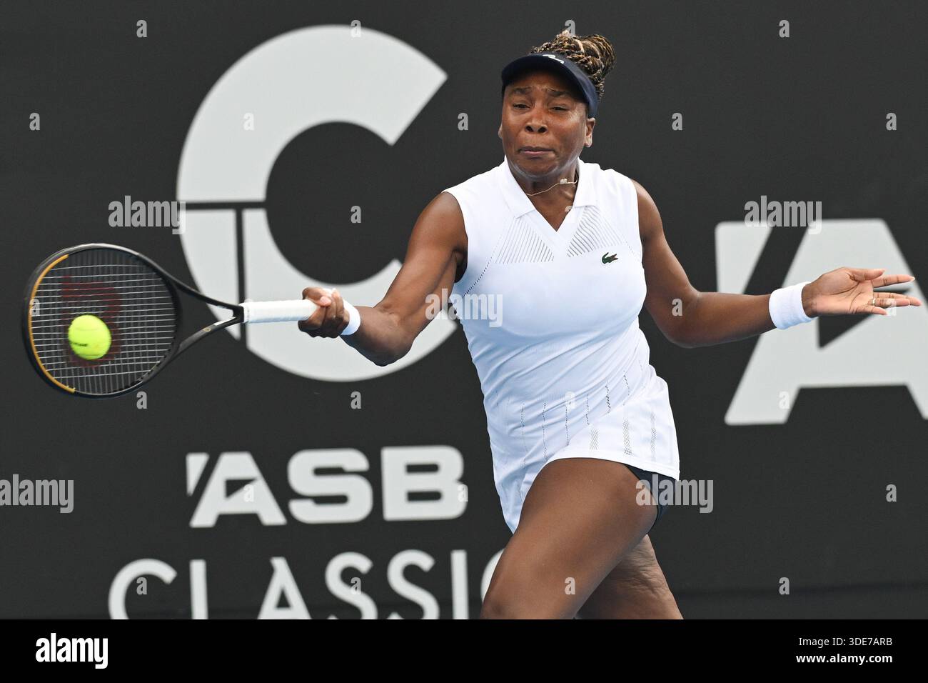 Venus Williams of the U.S. hits a forehand to Magda Linette of Poland ...