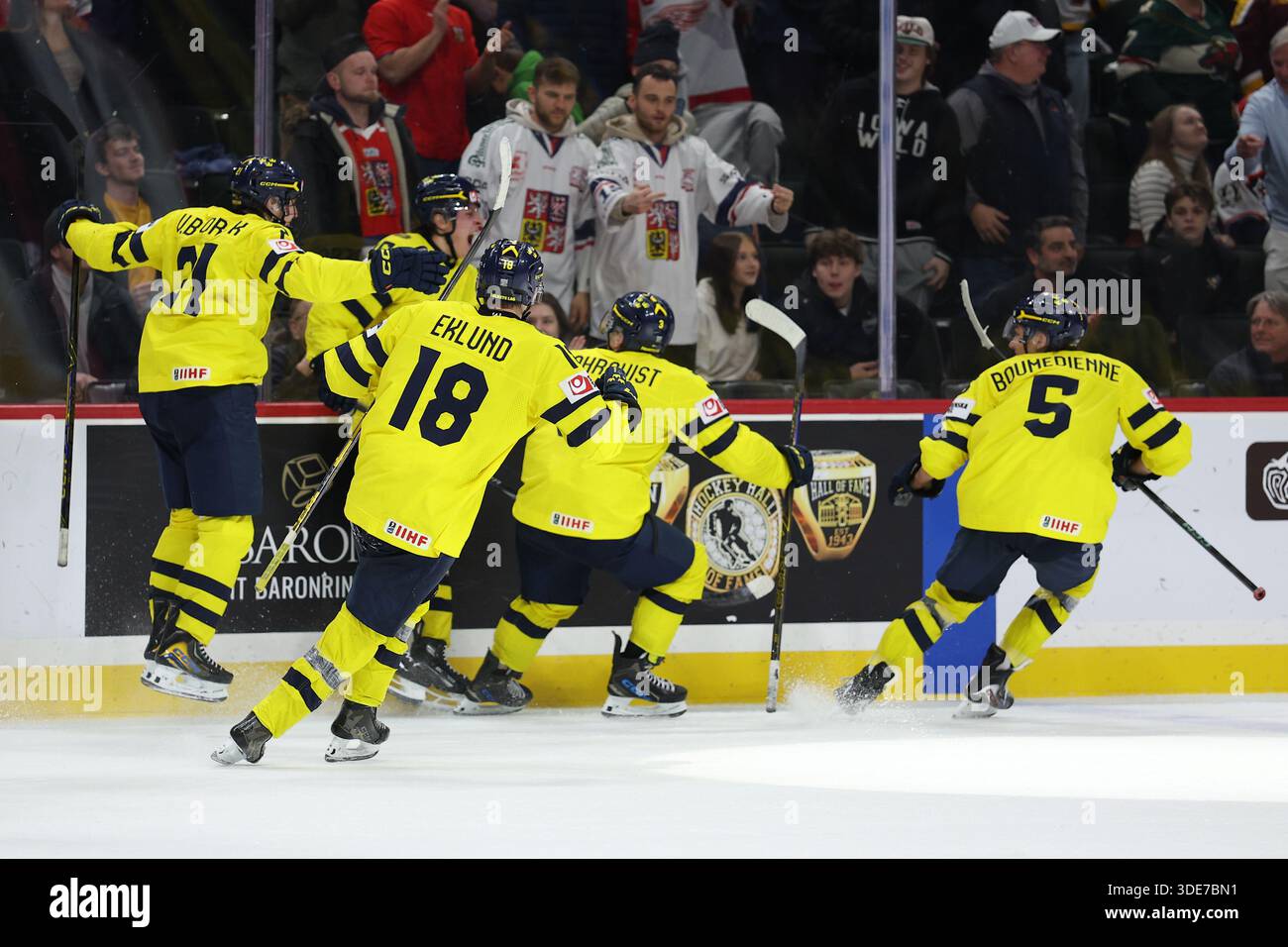 Sweden's Ivar Stenberg (15) celebrates with teammates after scoring a ...
