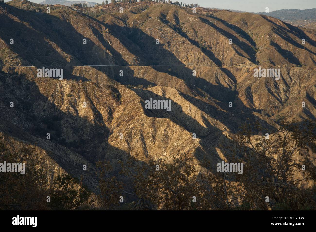Jagged hillside face, repeating patterns , texture & lines with sparse ...