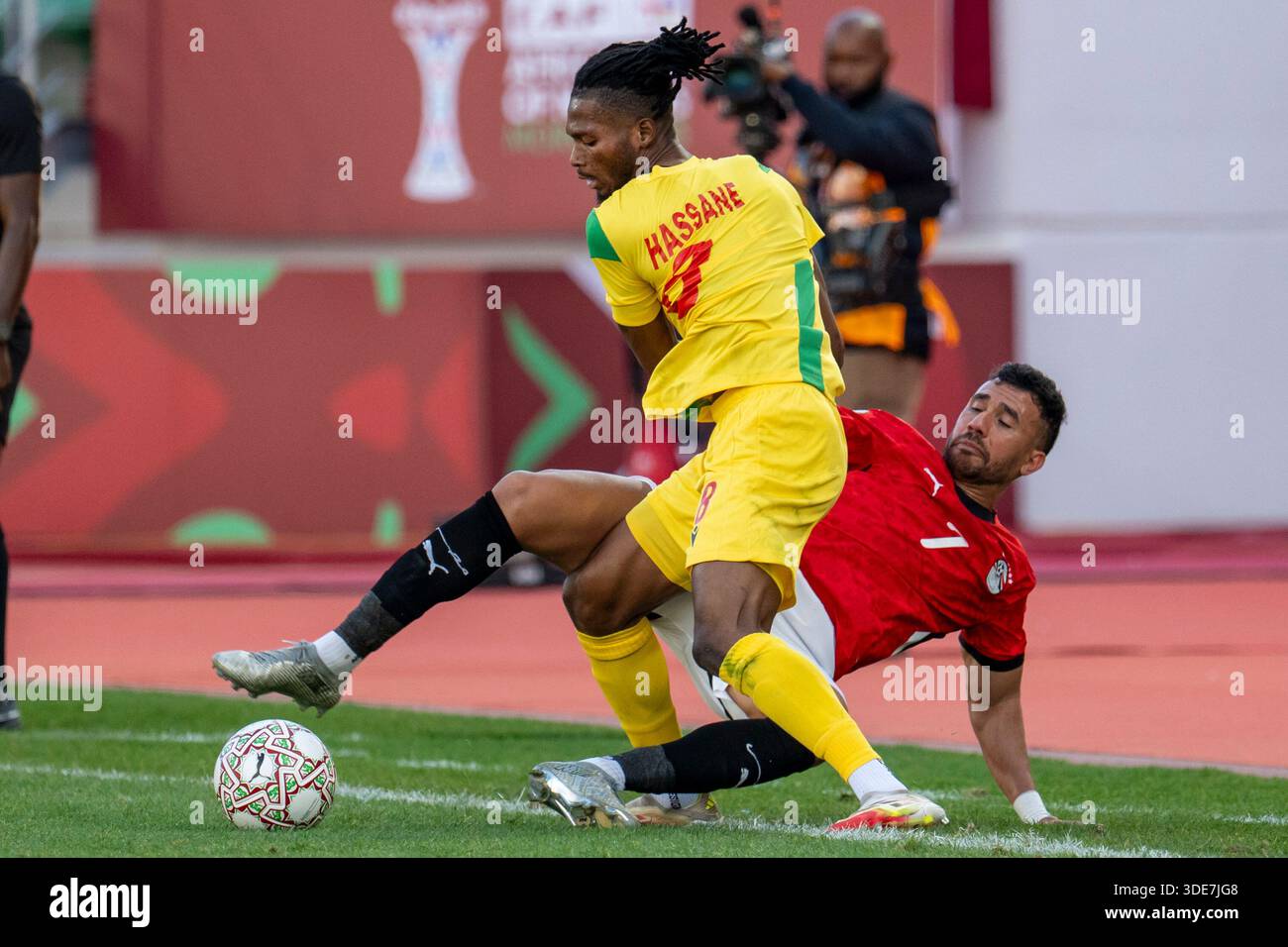 Imourane Hassane of Benin and Mahmoud Trezeguet of Egypt during the ...