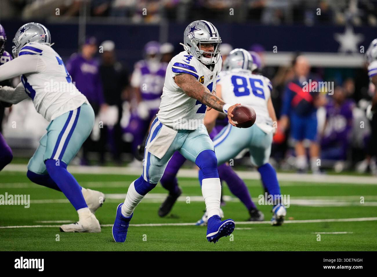 Dallas Cowboys' Dak Prescott hands the ball off during an NFL football ...