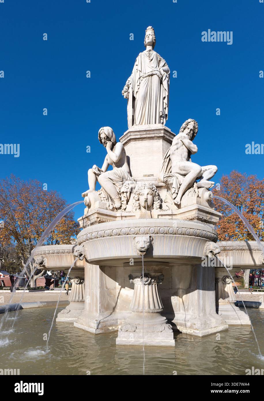 Pradier marble fountain at the entrance to the city of Nimes, France ...
