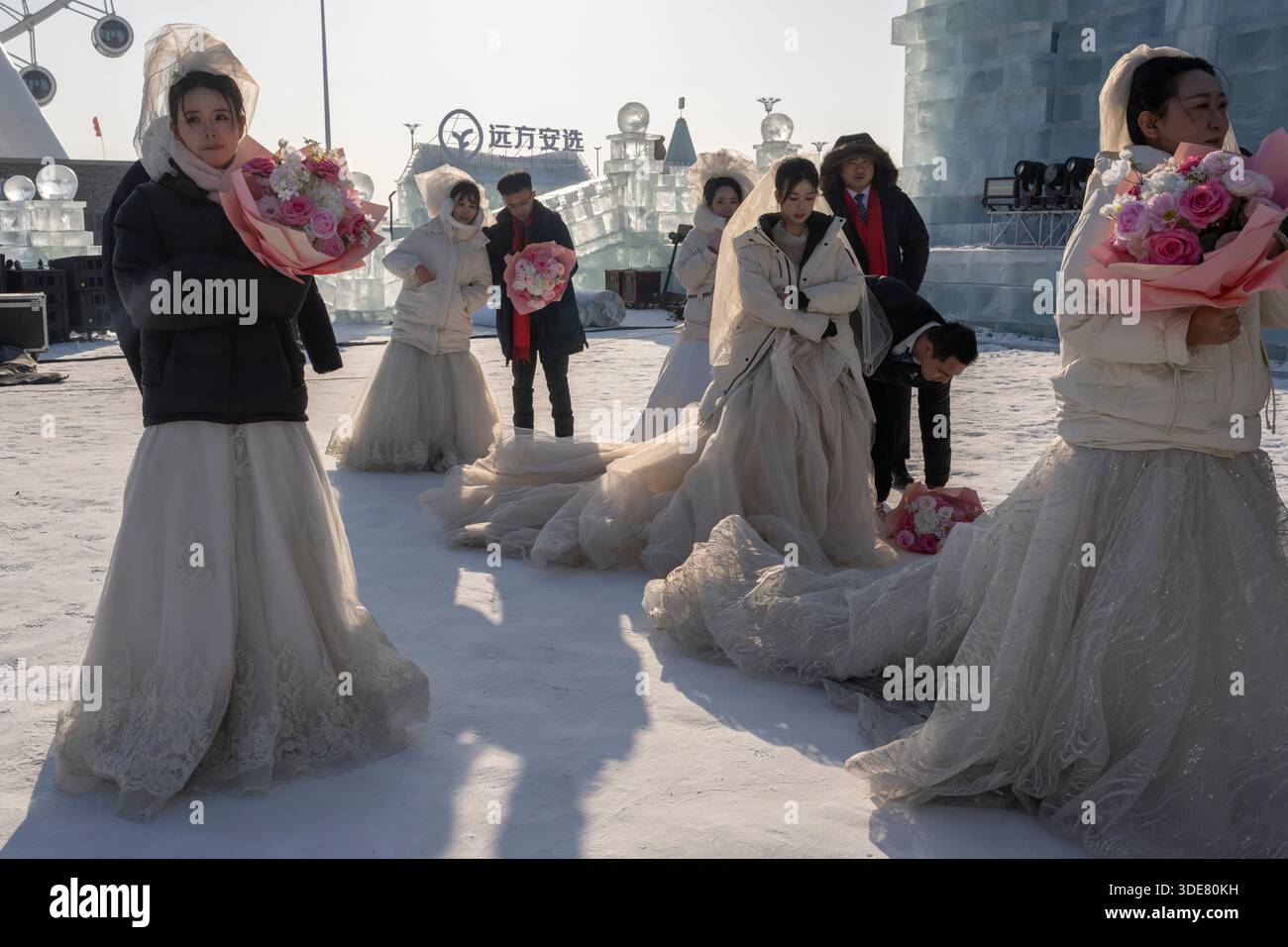 Couples prepare for a mass wedding during the annual Ice and Snow ...
