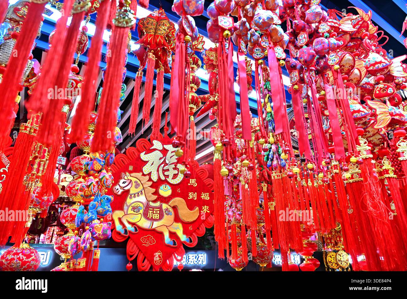 Residents select Spring Festival decorations at a market in Beijing ...
