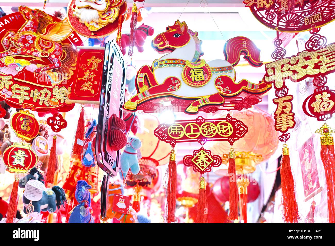 Residents select Spring Festival decorations at a market in Beijing ...