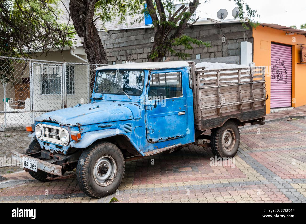 Old, rusty Toyota Land Cruiser pickup truck parked on the street ...