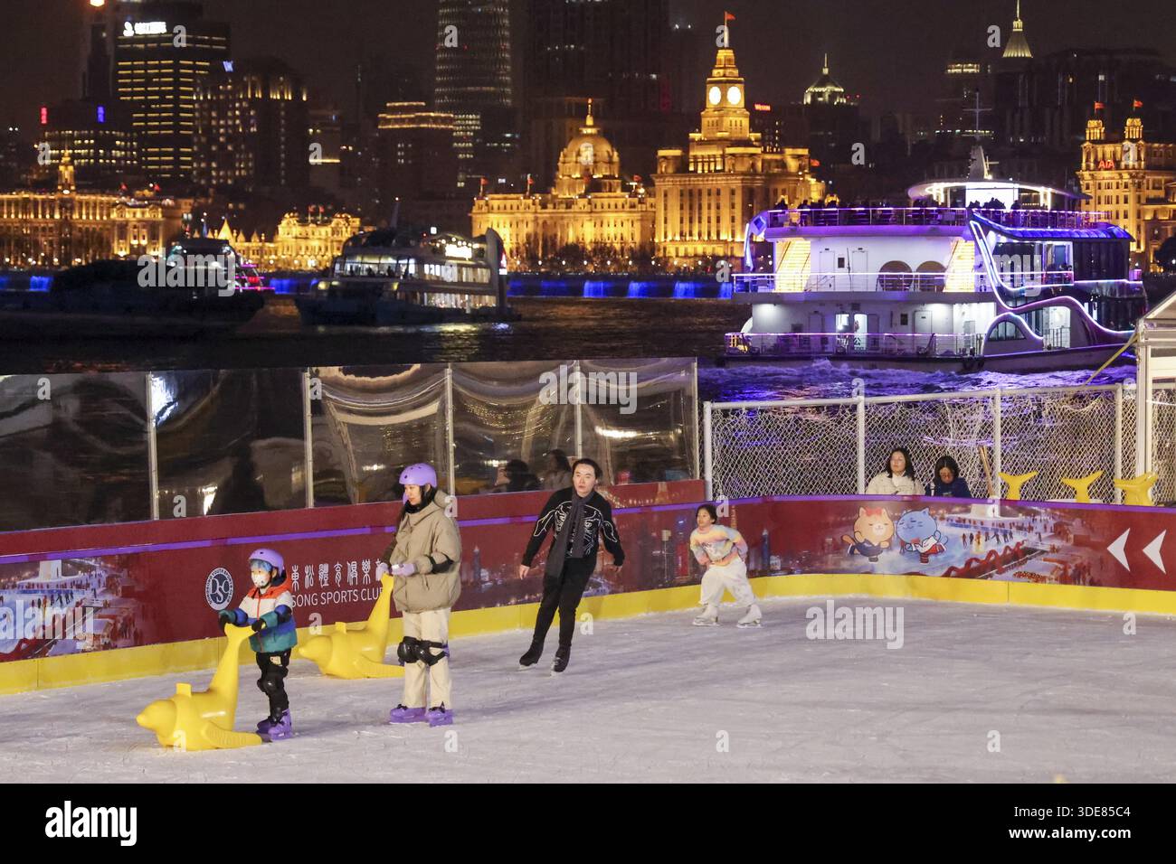 Visitors enjoy ice and snow fun at the North Bund in Shanghai, China, 3 ...
