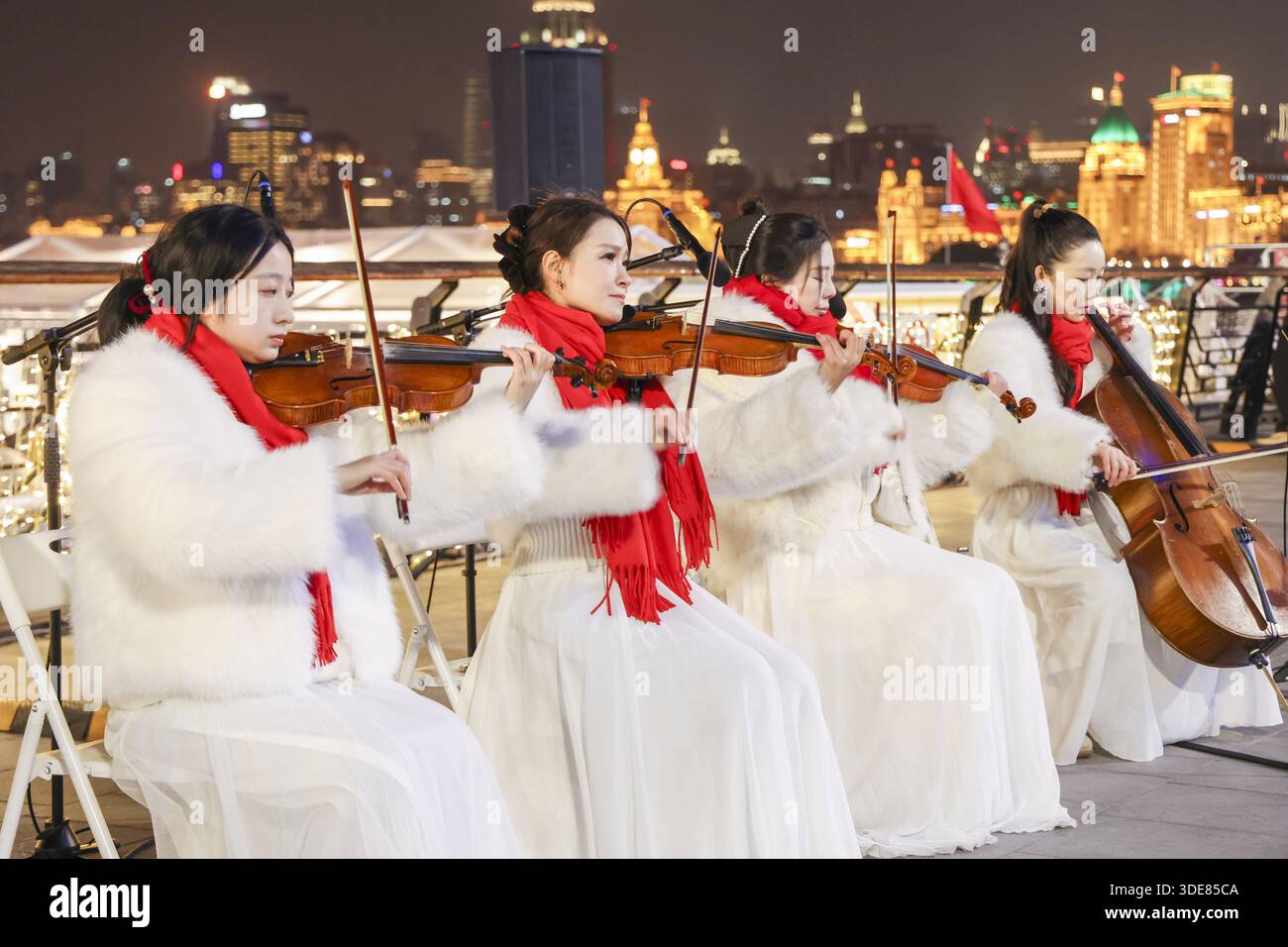 Visitors enjoy ice and snow fun at the North Bund in Shanghai, China, 3 ...