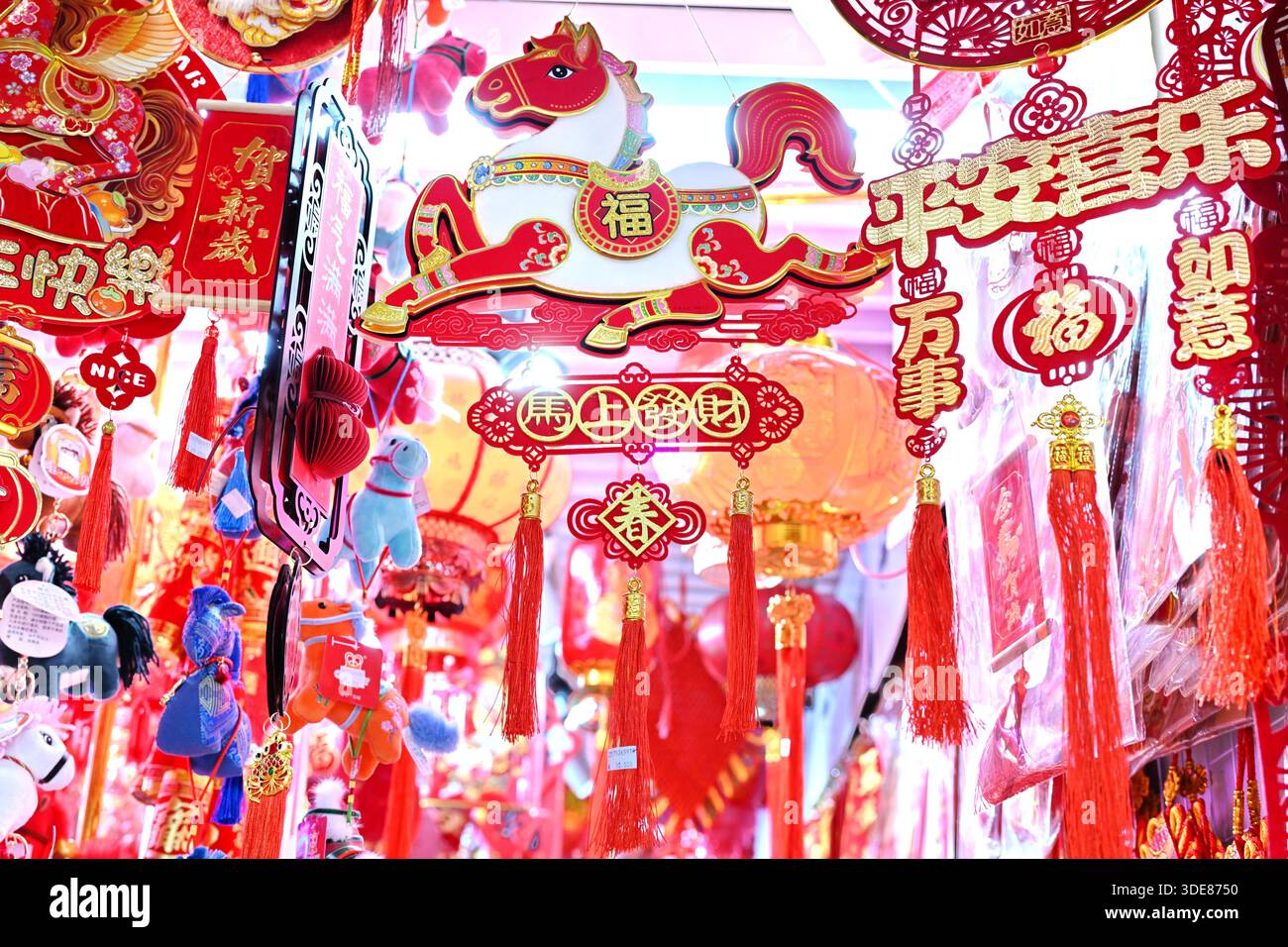Residents select Spring Festival decorations at a market in Beijing ...