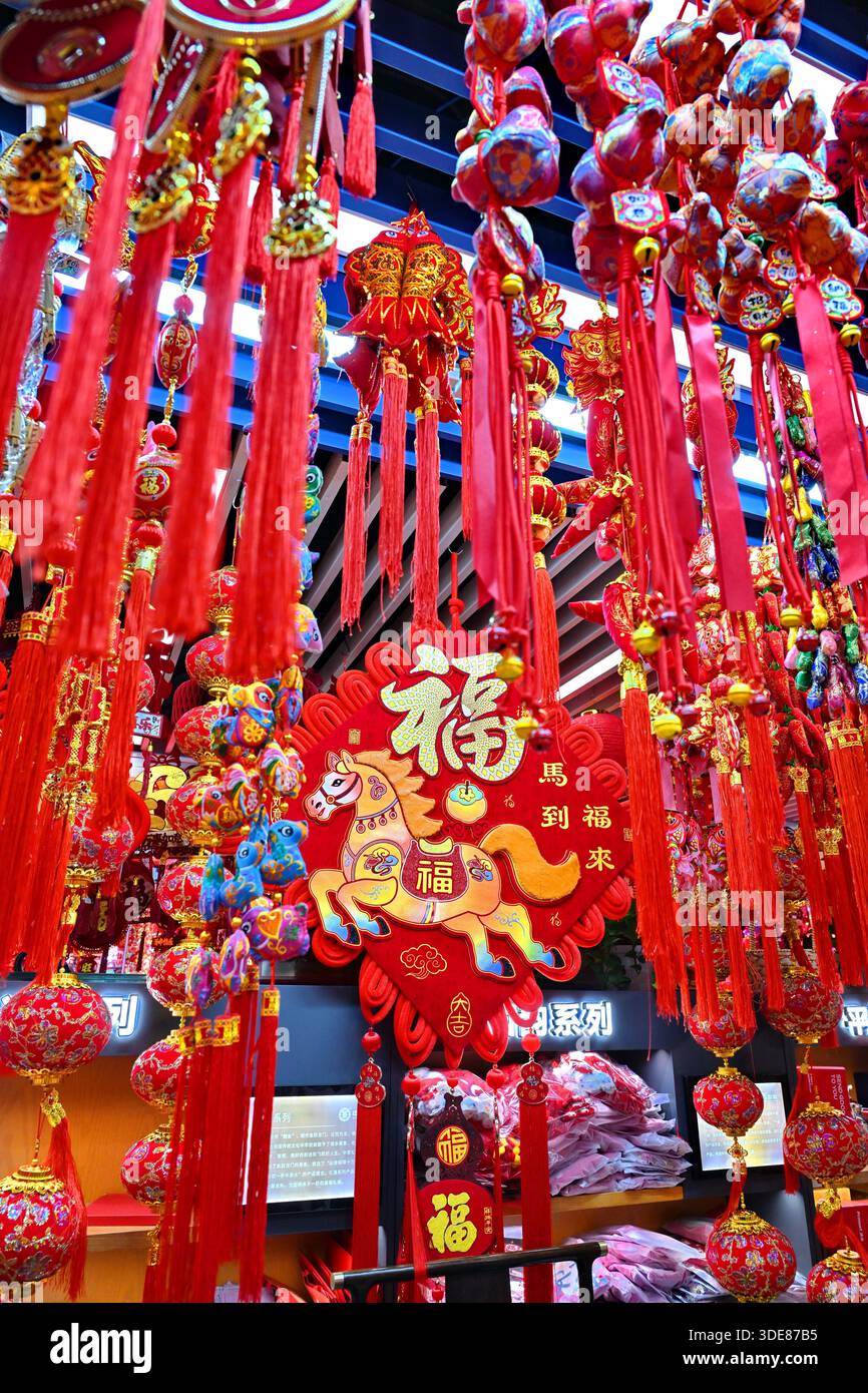 Residents select Spring Festival decorations at a market in Beijing ...
