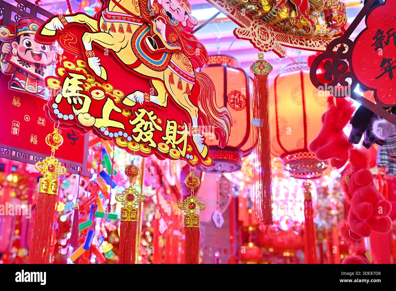 Residents select Spring Festival decorations at a market in Beijing ...