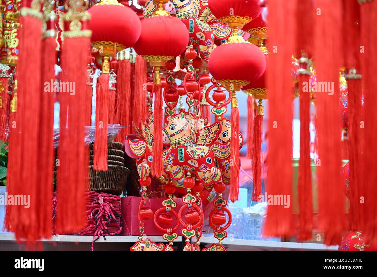 Residents select Spring Festival decorations at a market in Beijing ...
