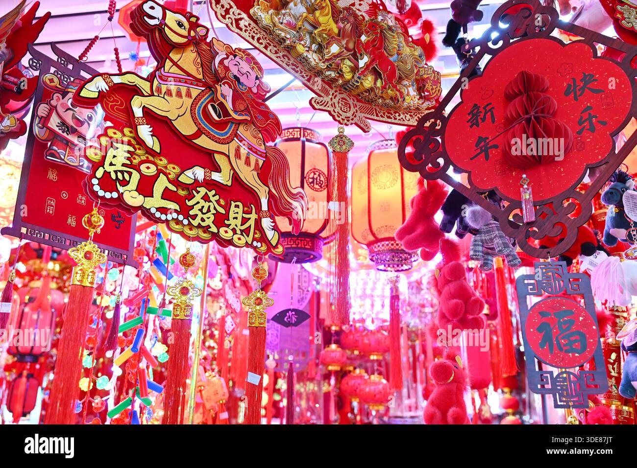 Residents select Spring Festival decorations at a market in Beijing ...