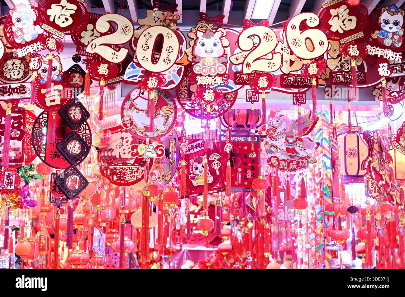 Residents select Spring Festival decorations at a market in Beijing ...