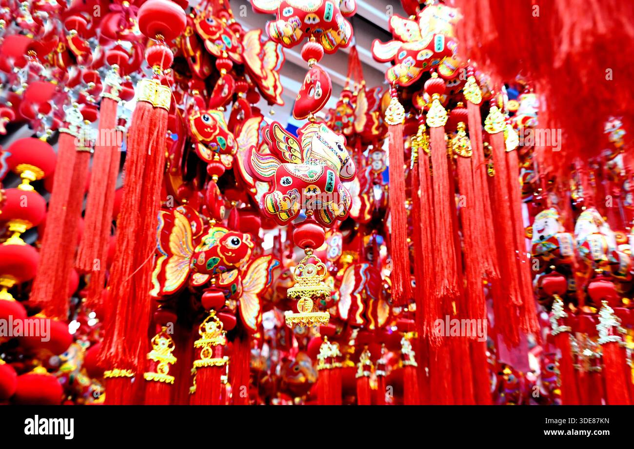Residents select Spring Festival decorations at a market in Beijing ...