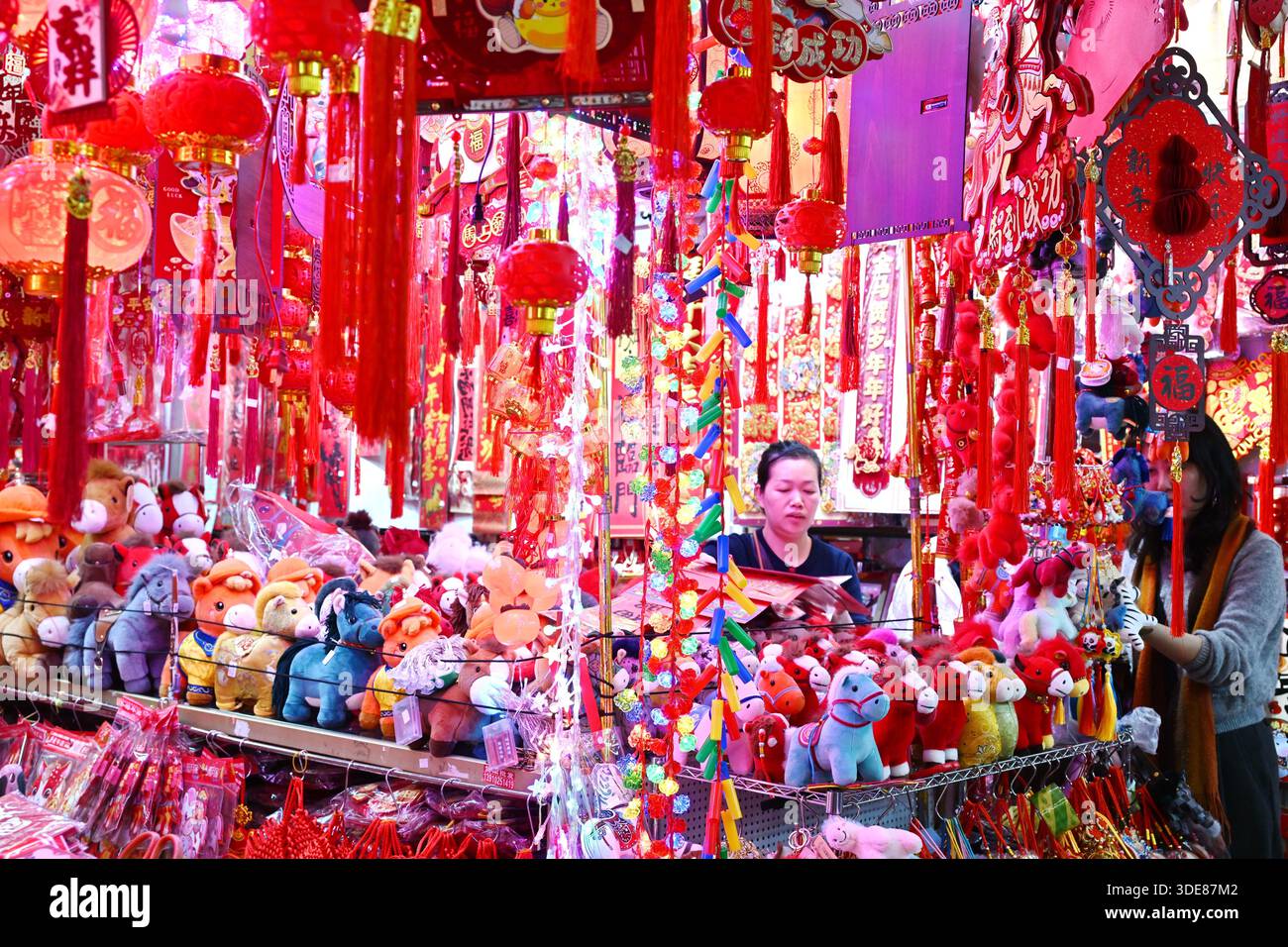 Residents select Spring Festival decorations at a market in Beijing ...