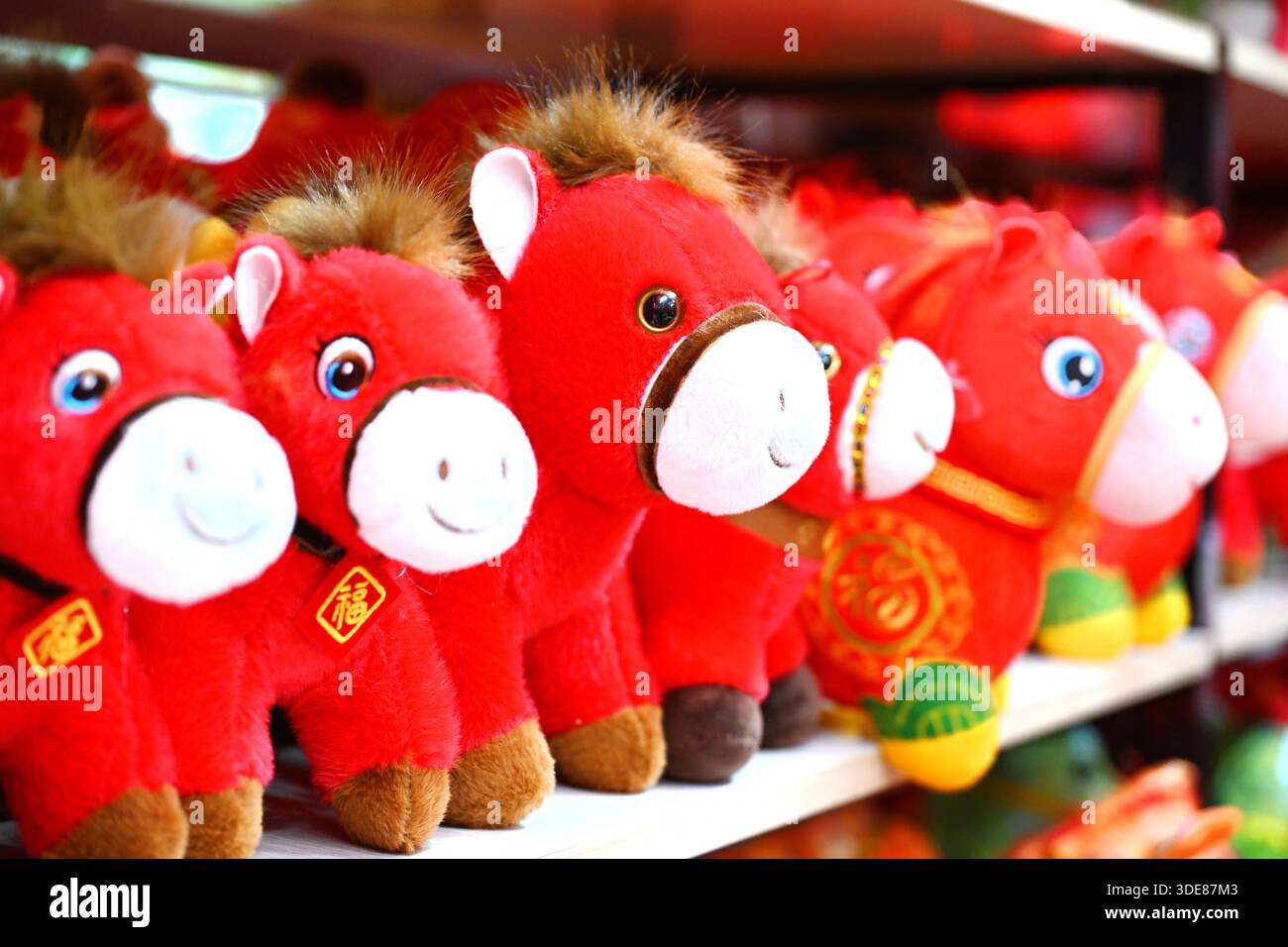 Residents select Spring Festival decorations at a market in Beijing ...