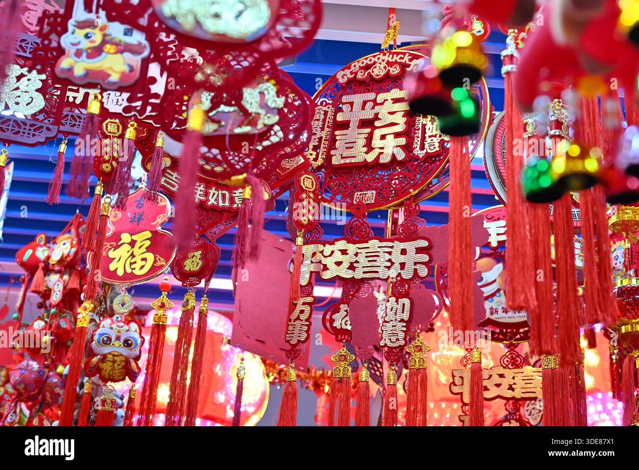 Residents select Spring Festival decorations at a market in Beijing ...