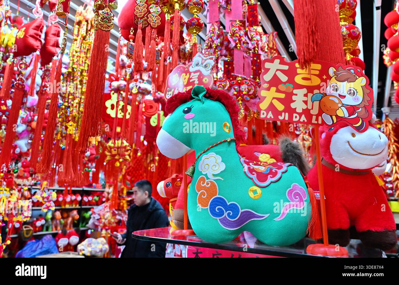 Residents select Spring Festival decorations at a market in Beijing ...