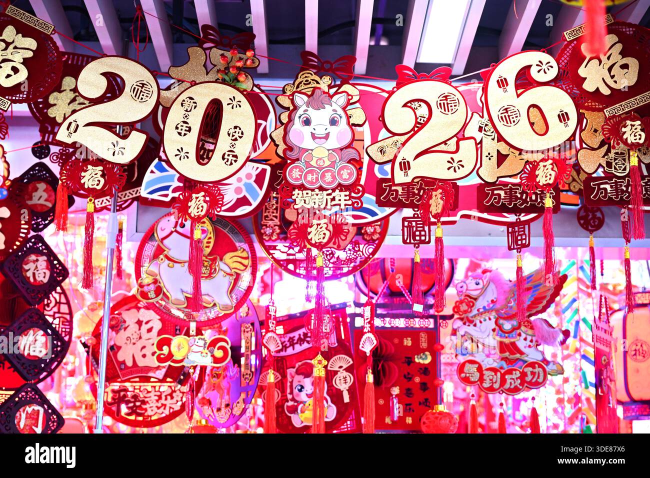 Residents select Spring Festival decorations at a market in Beijing ...