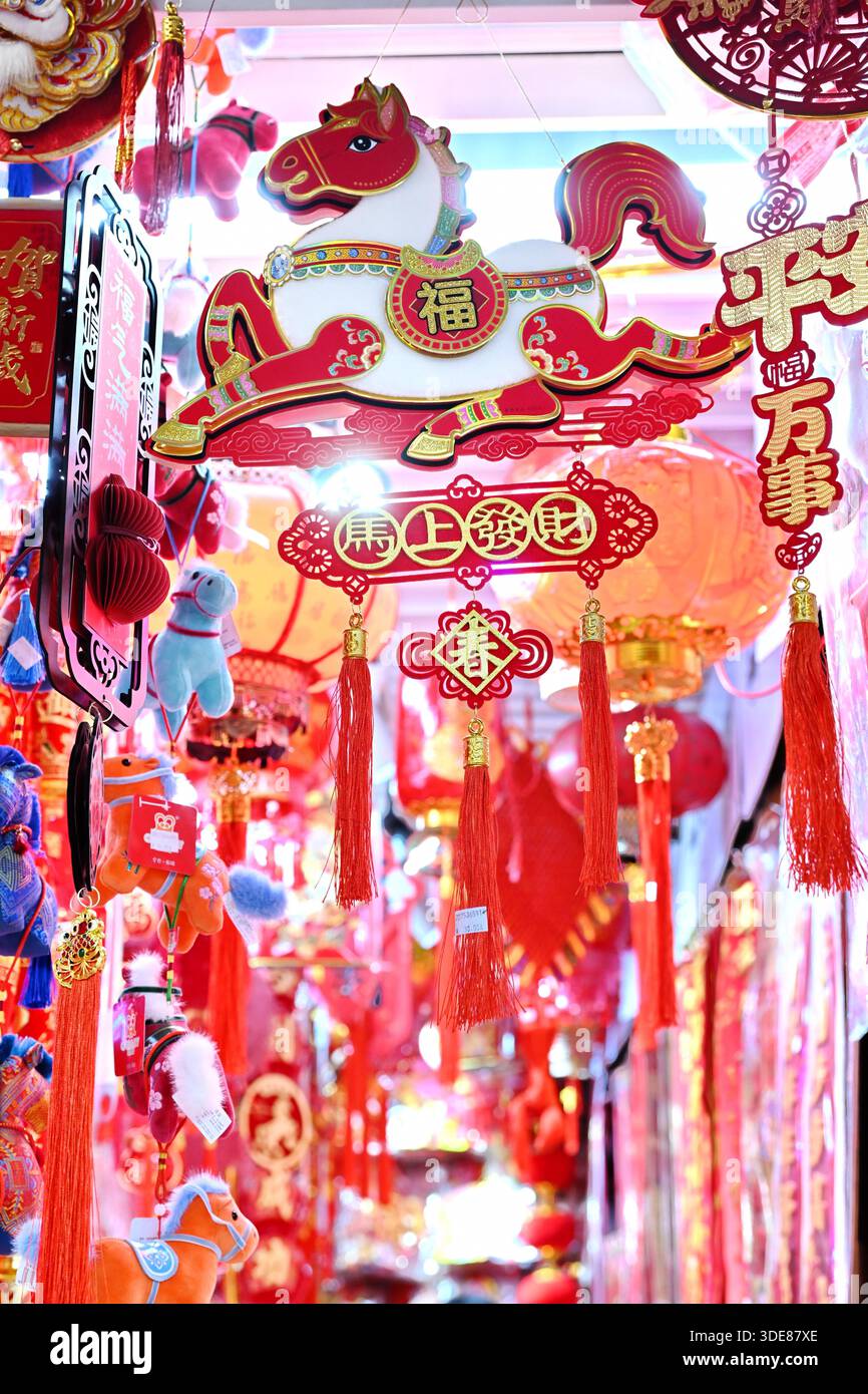 Residents select Spring Festival decorations at a market in Beijing ...