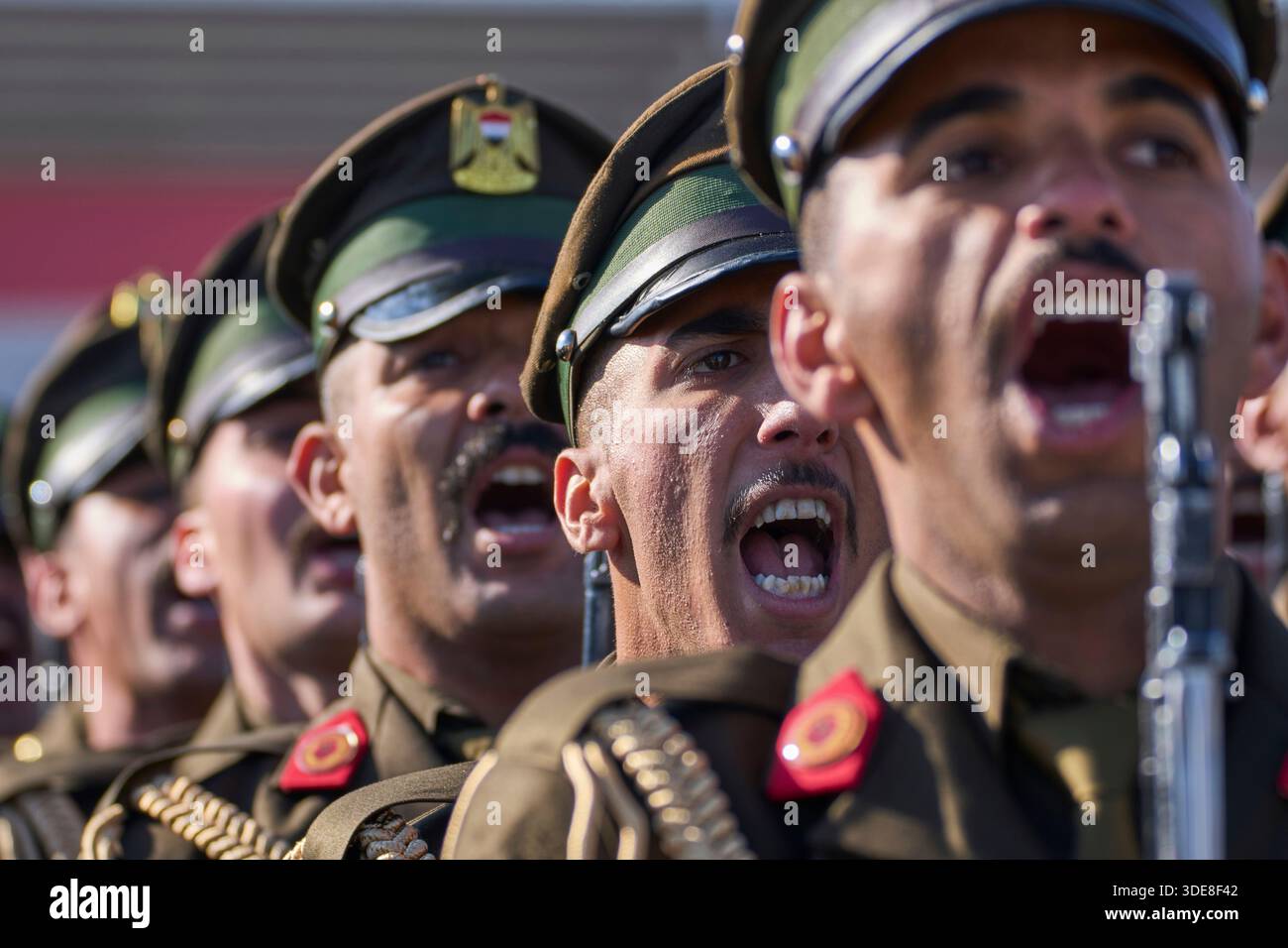 Newly graduated Iraqi Army officers march during Iraqi Army Day ...
