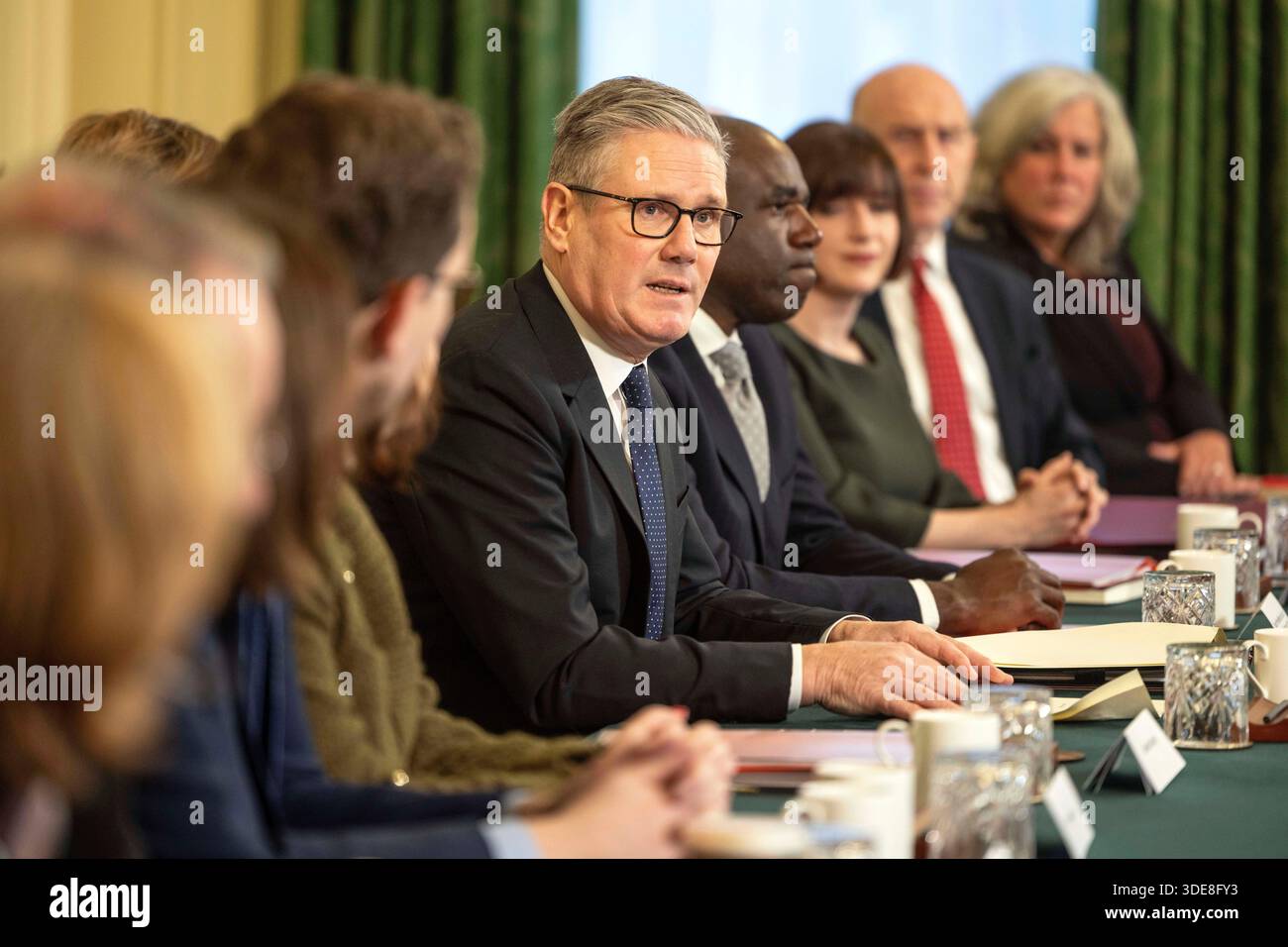 British Prime Minister Keir Starmer, center, makes a statement to the ...