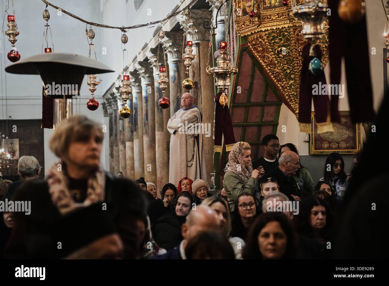 People attend Orthodox Christmas service at the Church of the Nativity ...