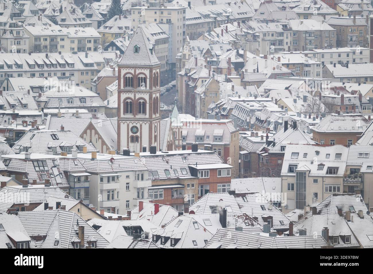 06 January 2026, Baden-Württemberg, Stuttgart: Snow-covered roofs can ...