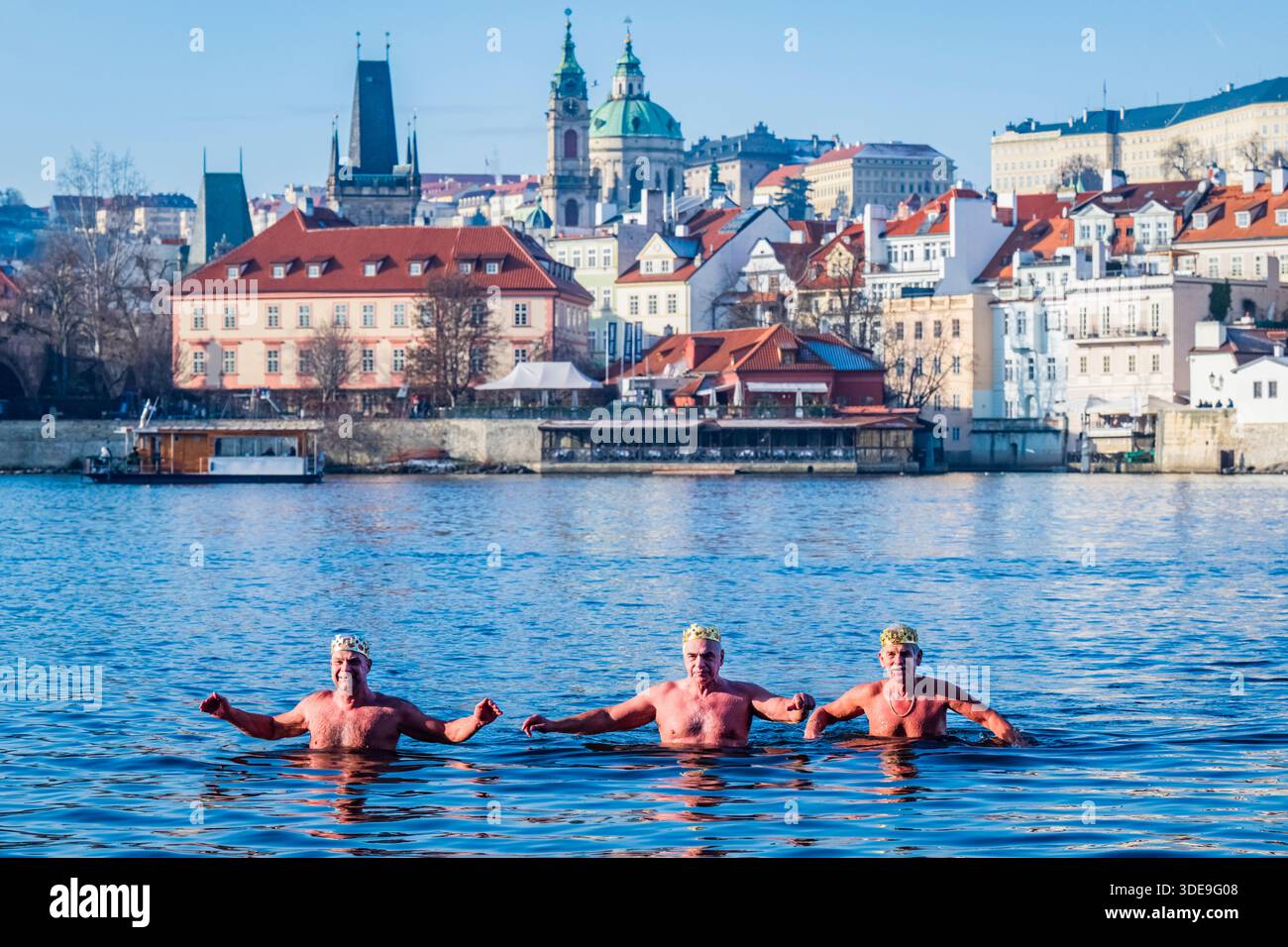 Winter swimmers take part in the traditional Three Kings swim in the ...