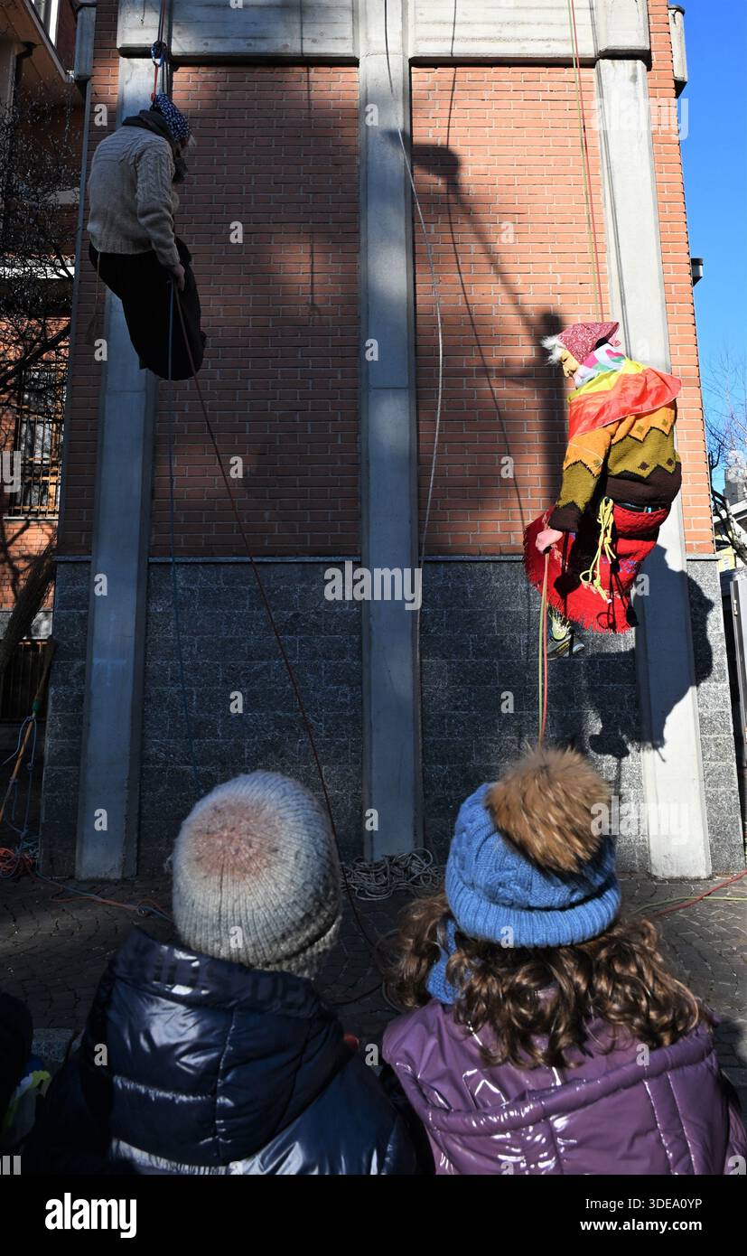Castellanza, Italy The Befana descends from the bell tower of the ...