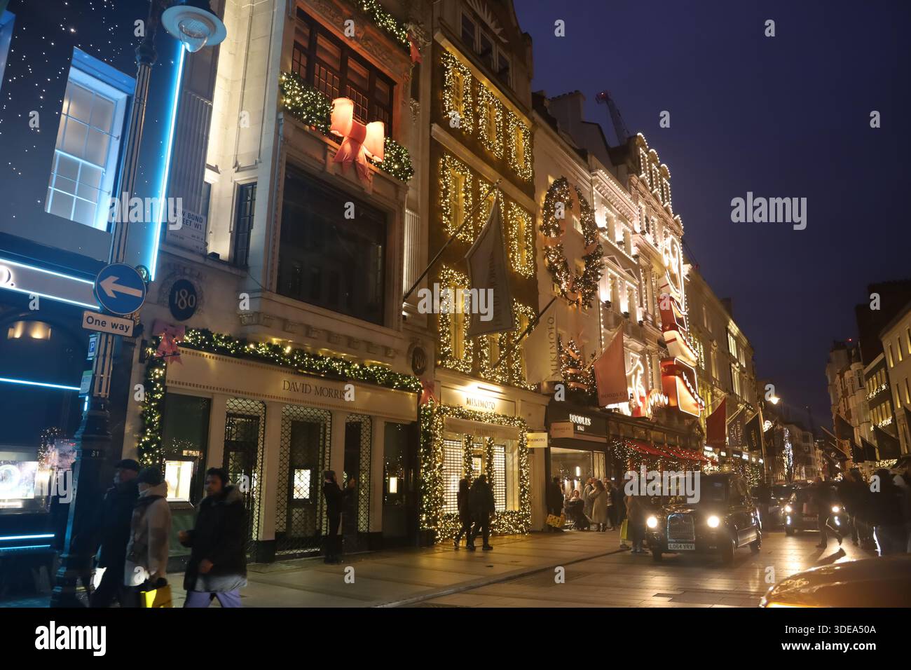 Luxury shops exhibit their Christmas spirit on Bond Street in London ...