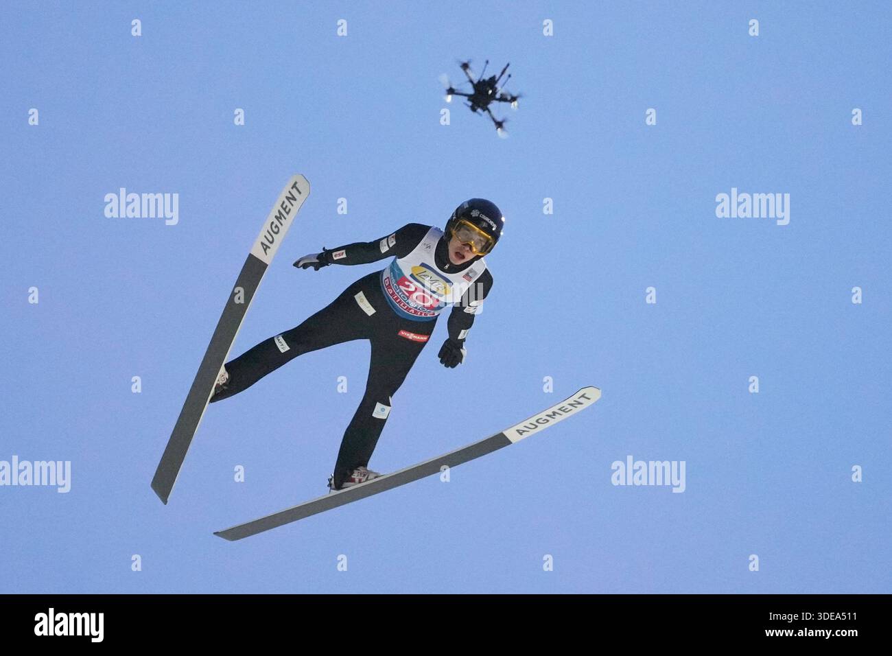 Valentin Foubert, of France, soars through the air during his first ...