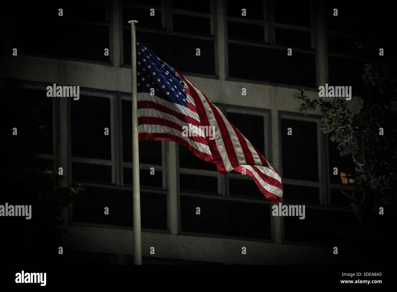 The American flag is seen flying at the United States embassy in Warsaw ...